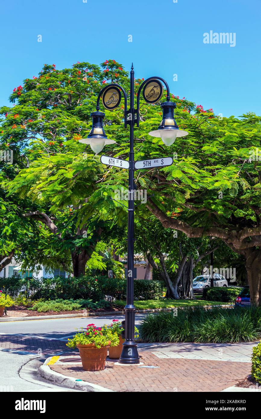 historical street sign 5th avenue in Naples, Florida under blue sky ...