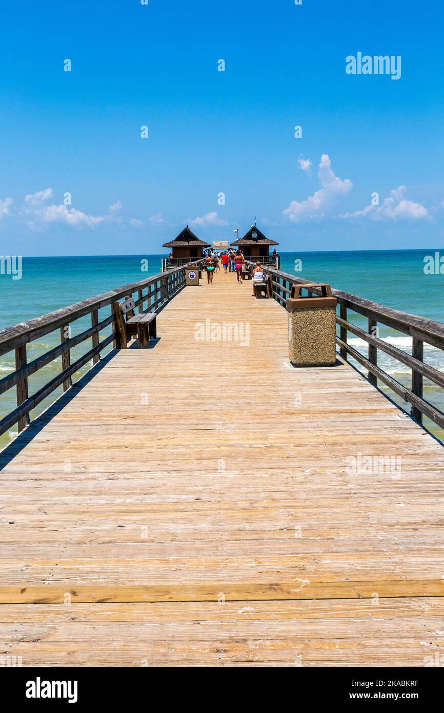 Midday naples pier beach hi-res stock photography and images - Alamy