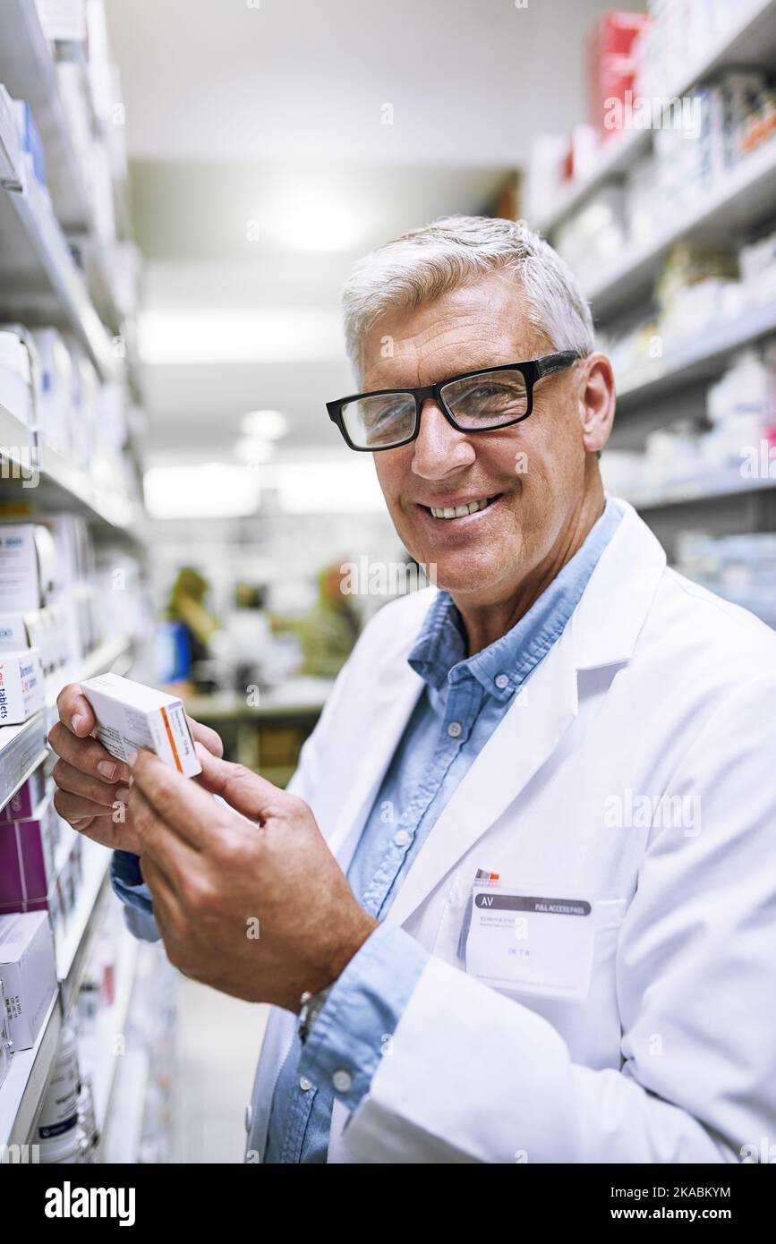 Make the pain go away with this. Portrait of a cheerful mature male ...