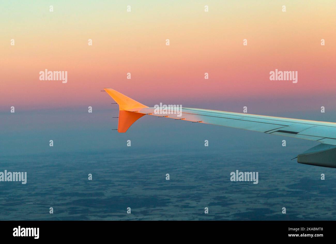 Wing airplane flying above morning hi-res stock photography and images ...