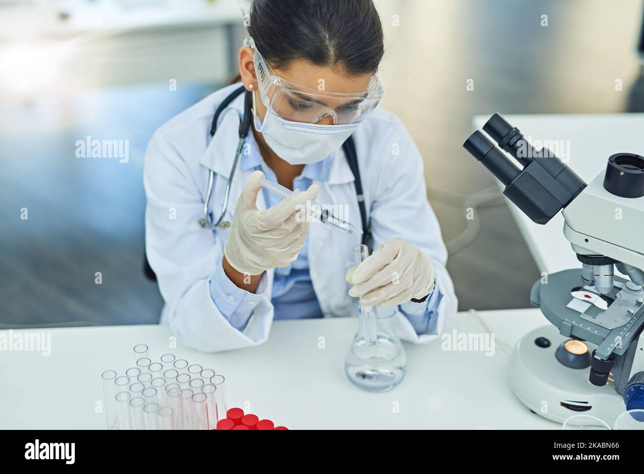 Making sense of the world through science. a young scientist working in ...