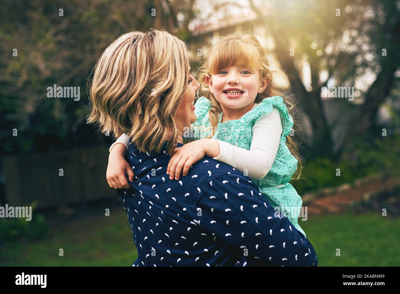 Kids make life chaotic but also full of love. a mother and her daughter ...