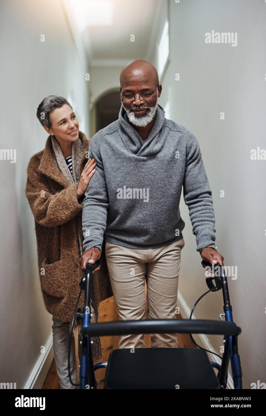 Right by your side as we grow older. a senior woman helping her husband ...