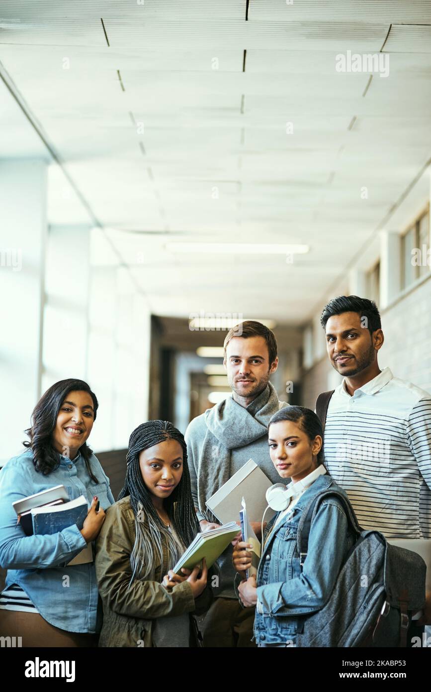 Were here to learn. Cropped portrait of a group of university students ...