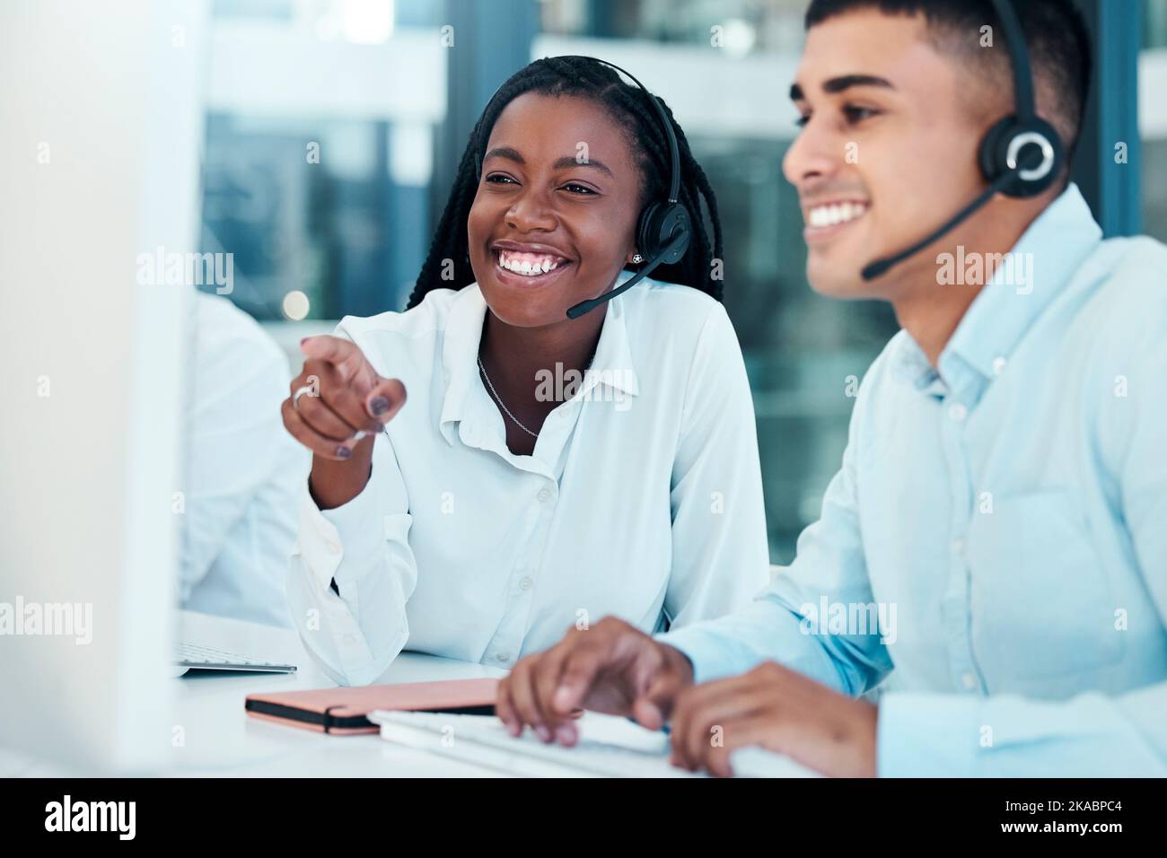 Call center, happy manager and crm employee training on computer for ... Call center, happy manager and crm employee training on computer for ...