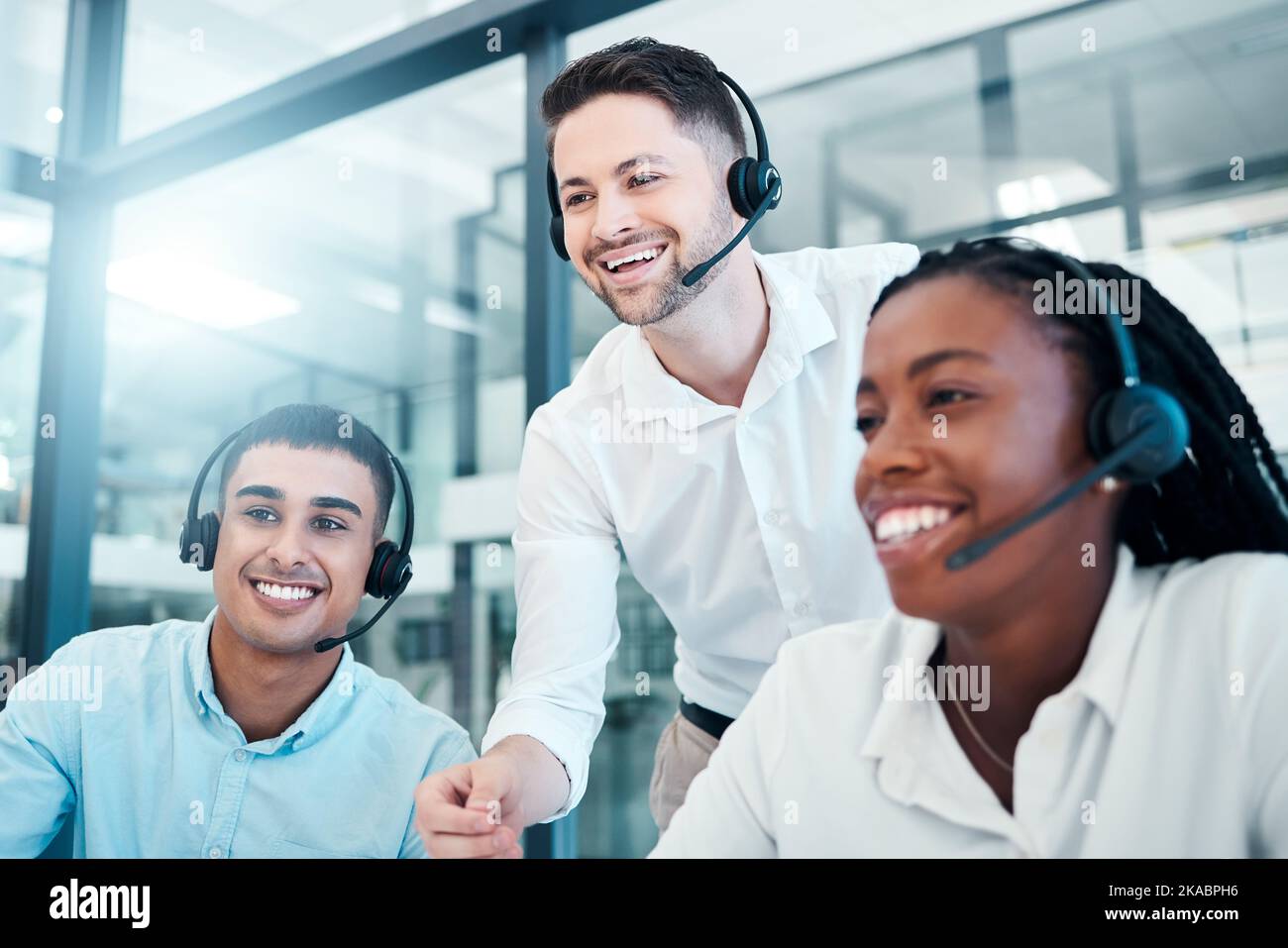 Customer support, call center and team working together in office ...