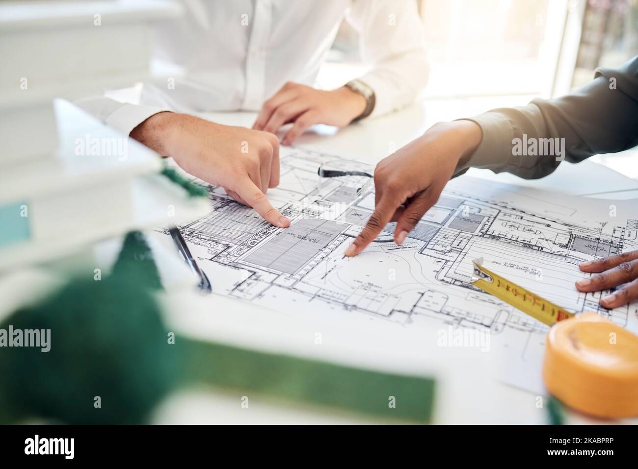 Blueprint, design and hands of architects planning construction ...