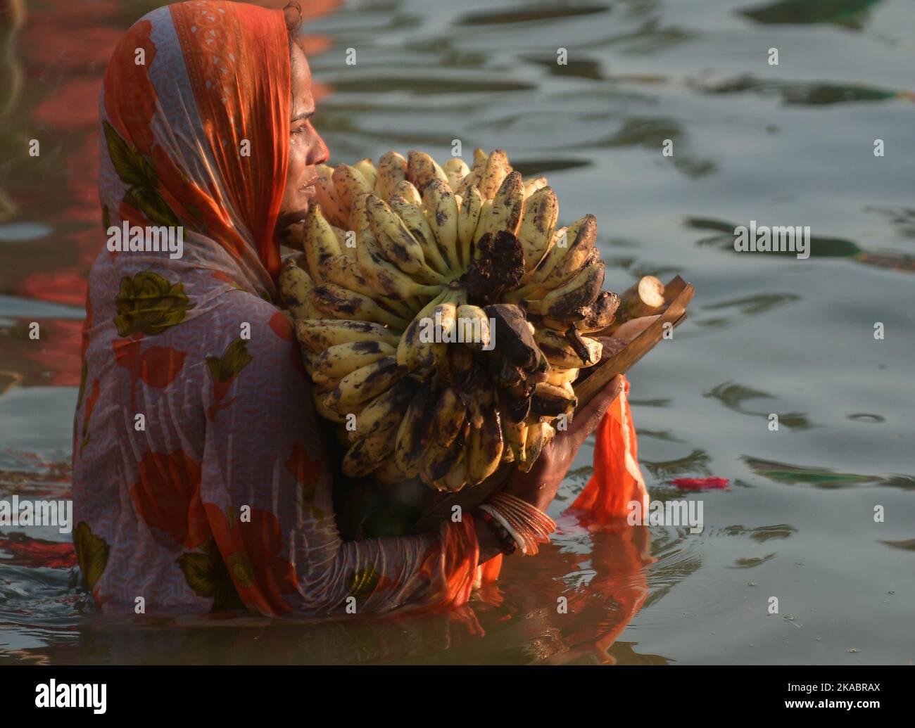 Hindu devotees perform rituals and offer prayers to the Sun God on the ...