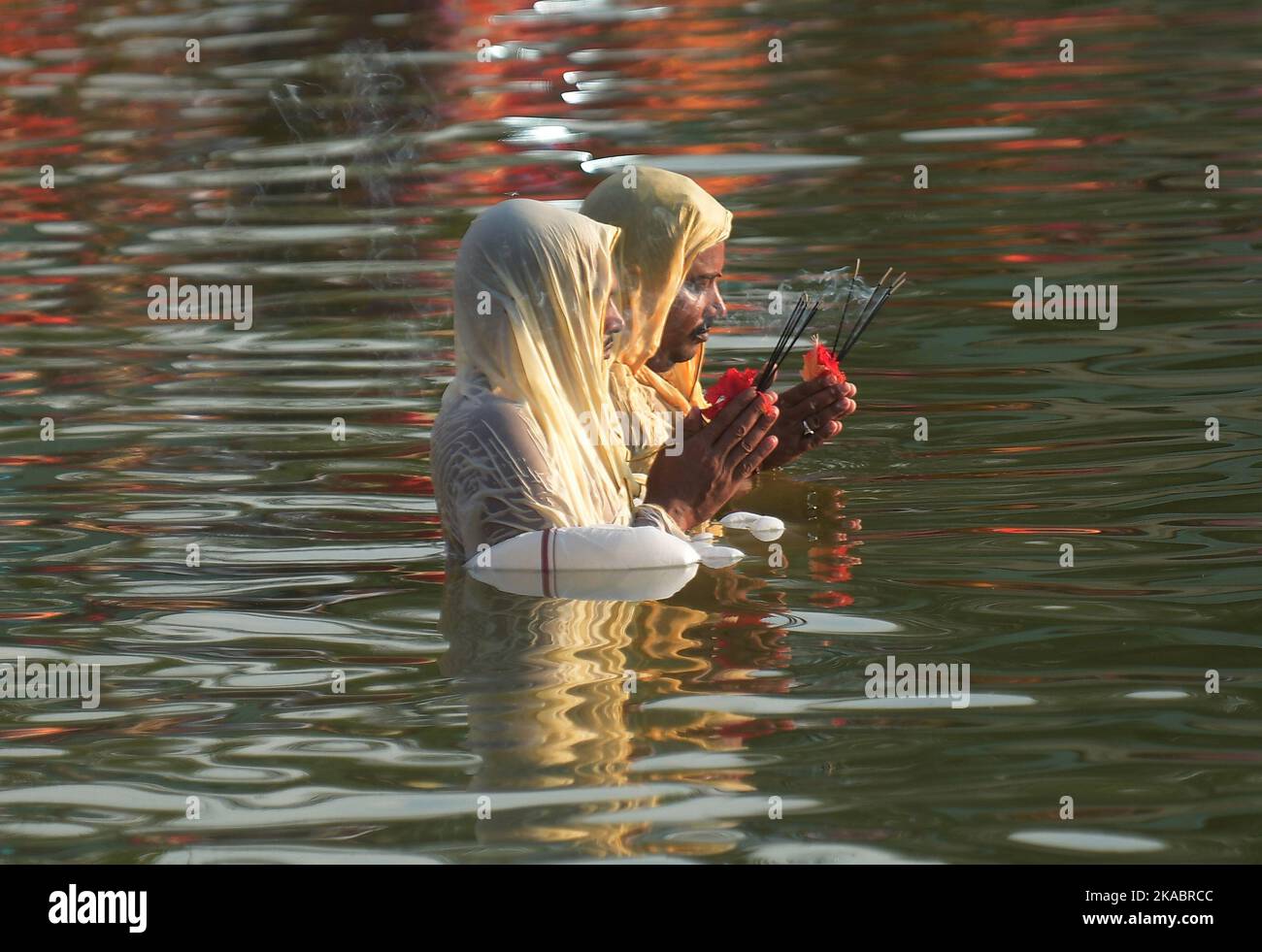 Hindu devotees perform rituals and offer prayers to the Sun God on the ...