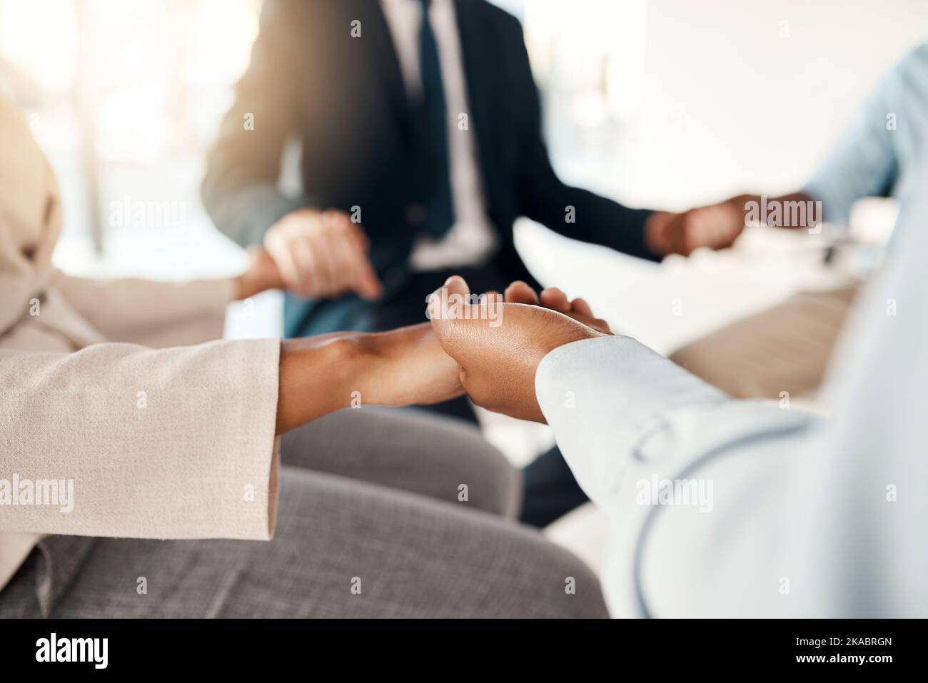 Success, prayer and business team holding hands in office meeting ...