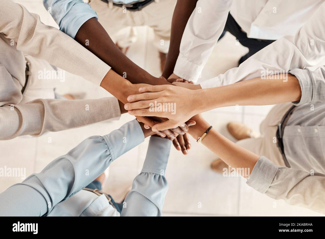 Group hands stack, support business team and motivation solidarity together in office with ...