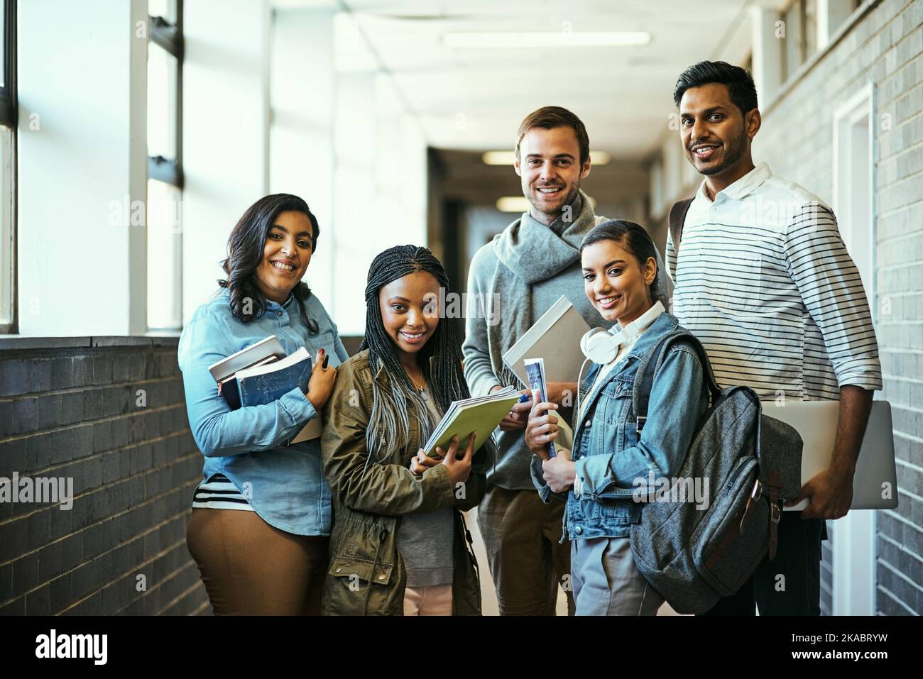 Friends complete the university experience. Cropped portrait of a group ...