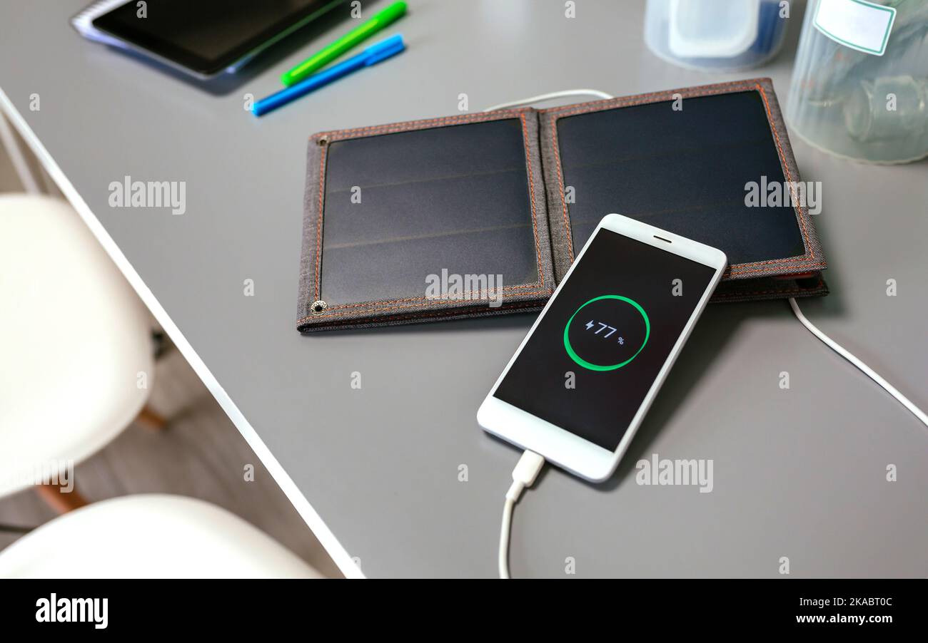 Mobile phone solar energy hi-res stock photography and images - Alamy