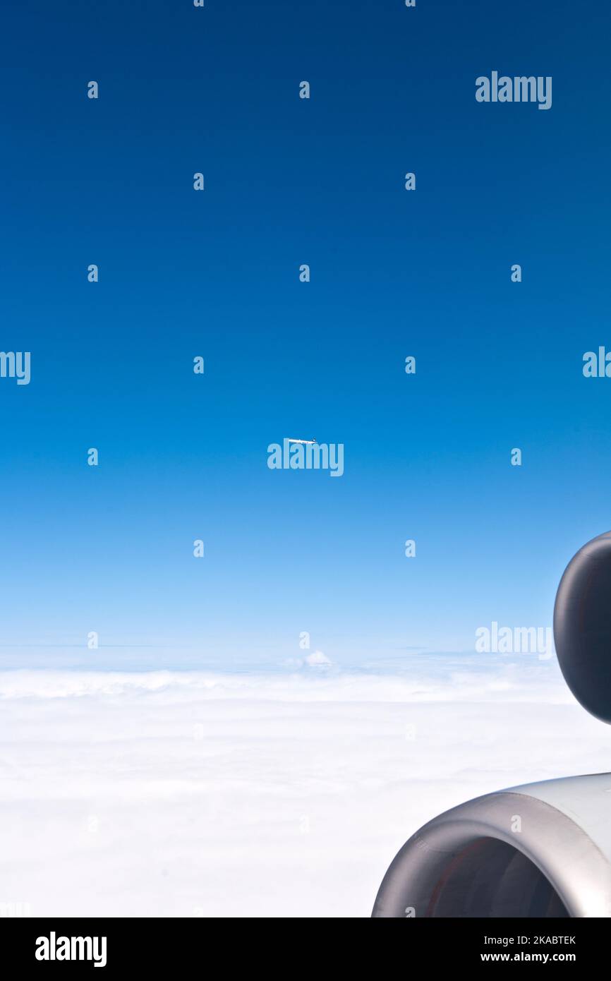 aircraft flying over the clouds Stock Photo - Alamy