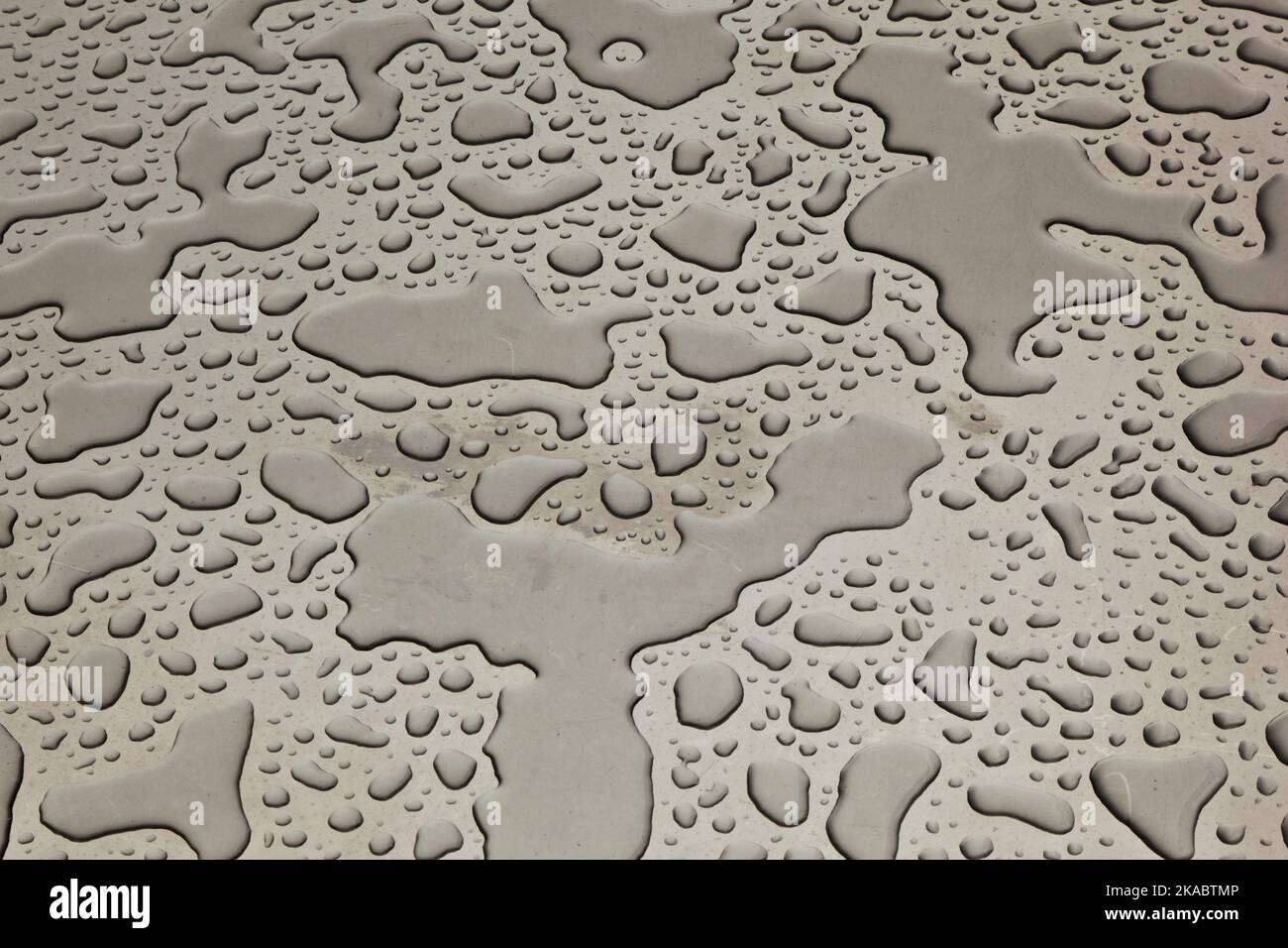 water on silver table gives a harmonic pattern and fantasy creates ...