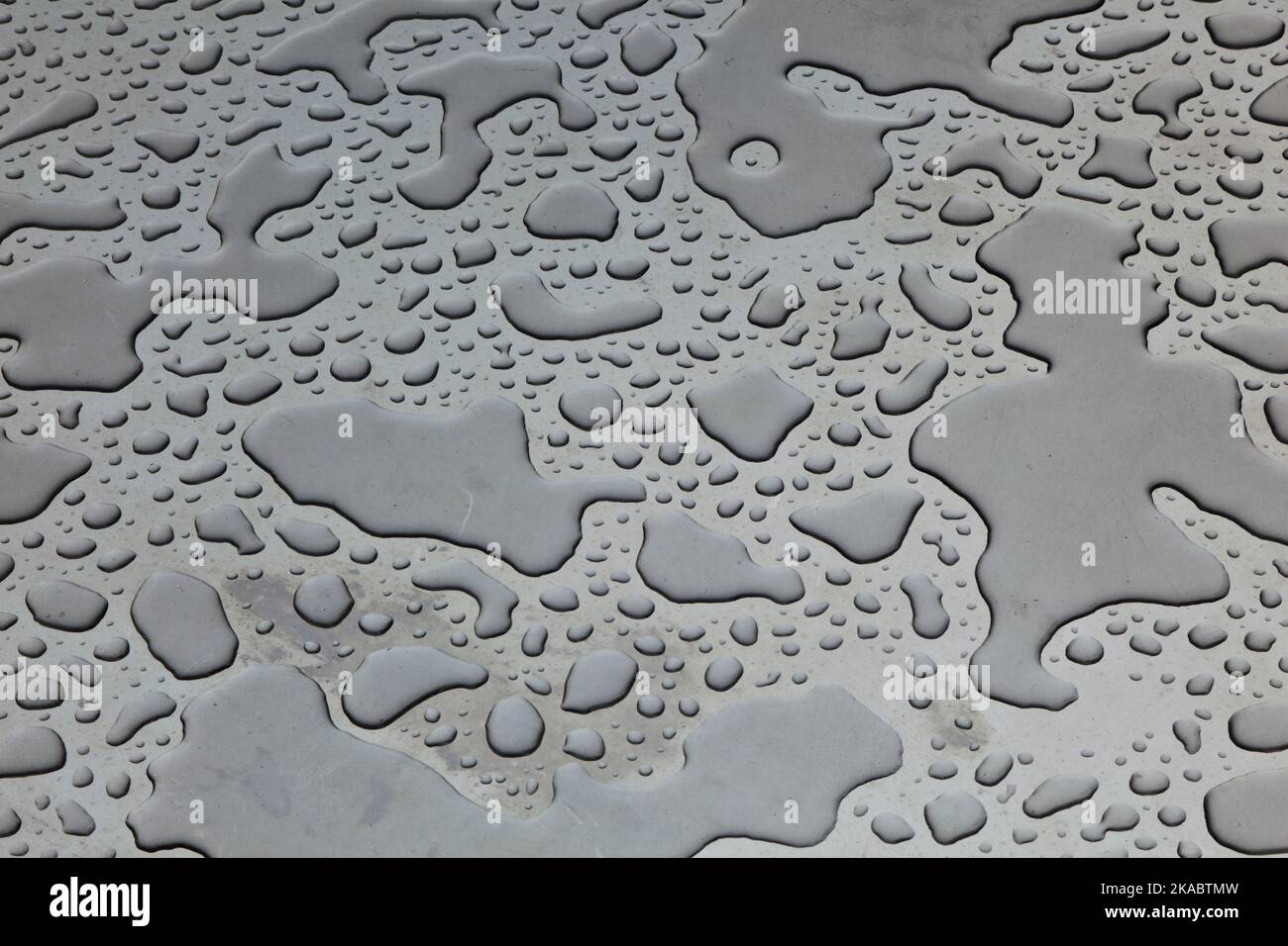 water on silver table gives a harmonic pattern and fantasy creates ...