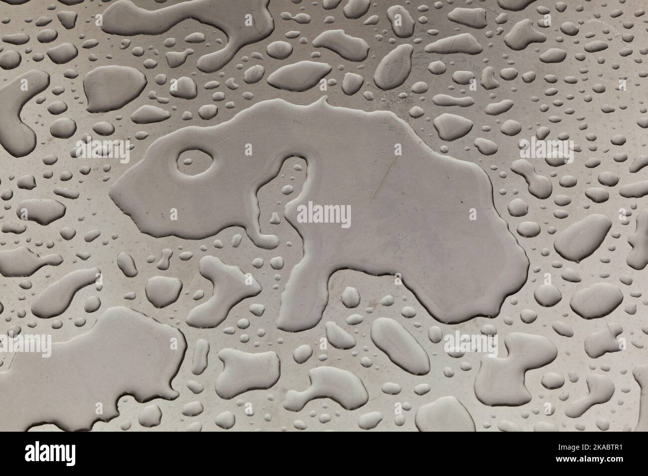 water on silver table gives a harmonic pattern and fantasy creates ...