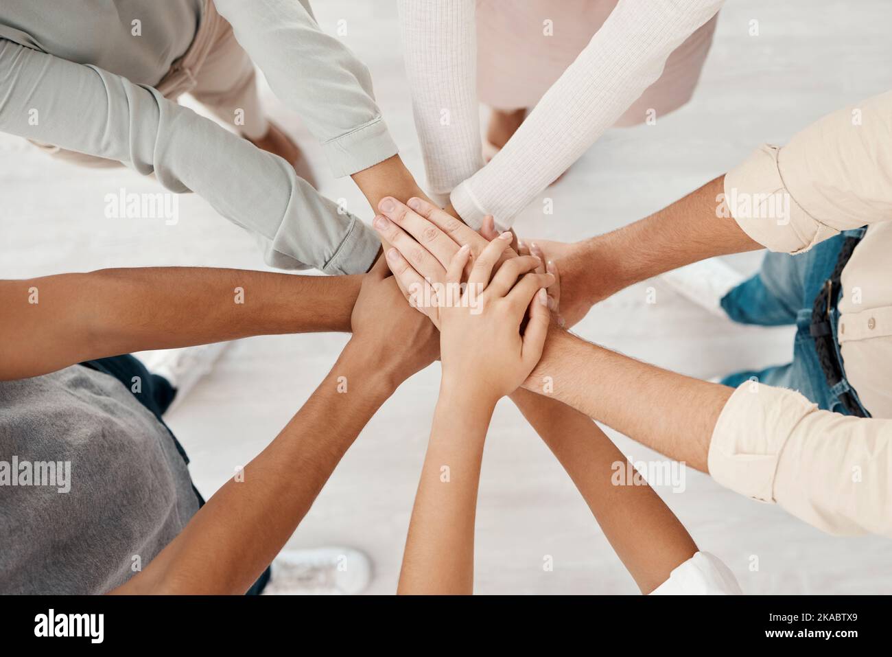 Support, solidarity and hands stacked of business people in a meeting ...