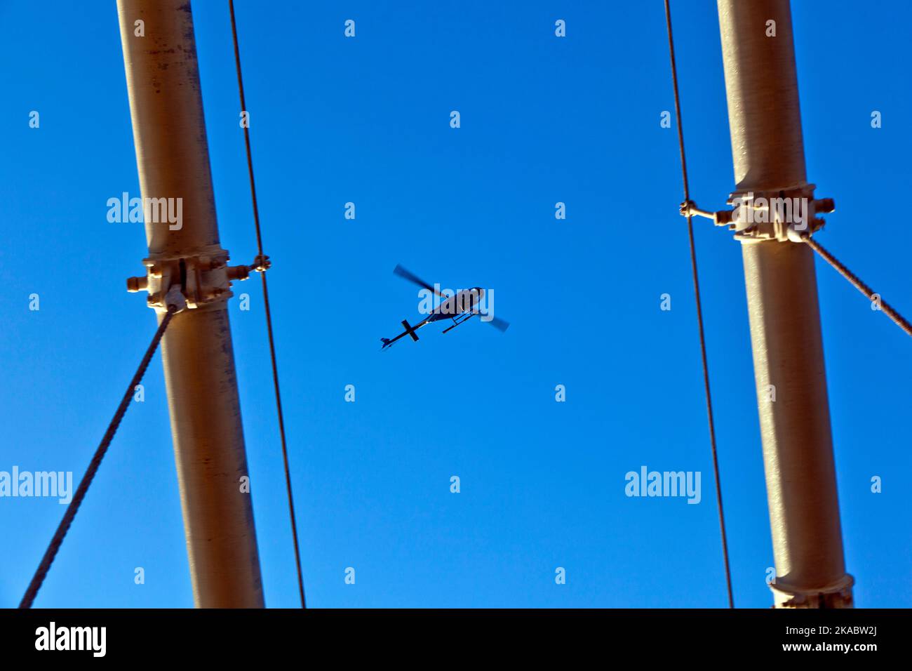 helicopter overflying famous Brooklyn Bridge in New York Stock Photo ...
