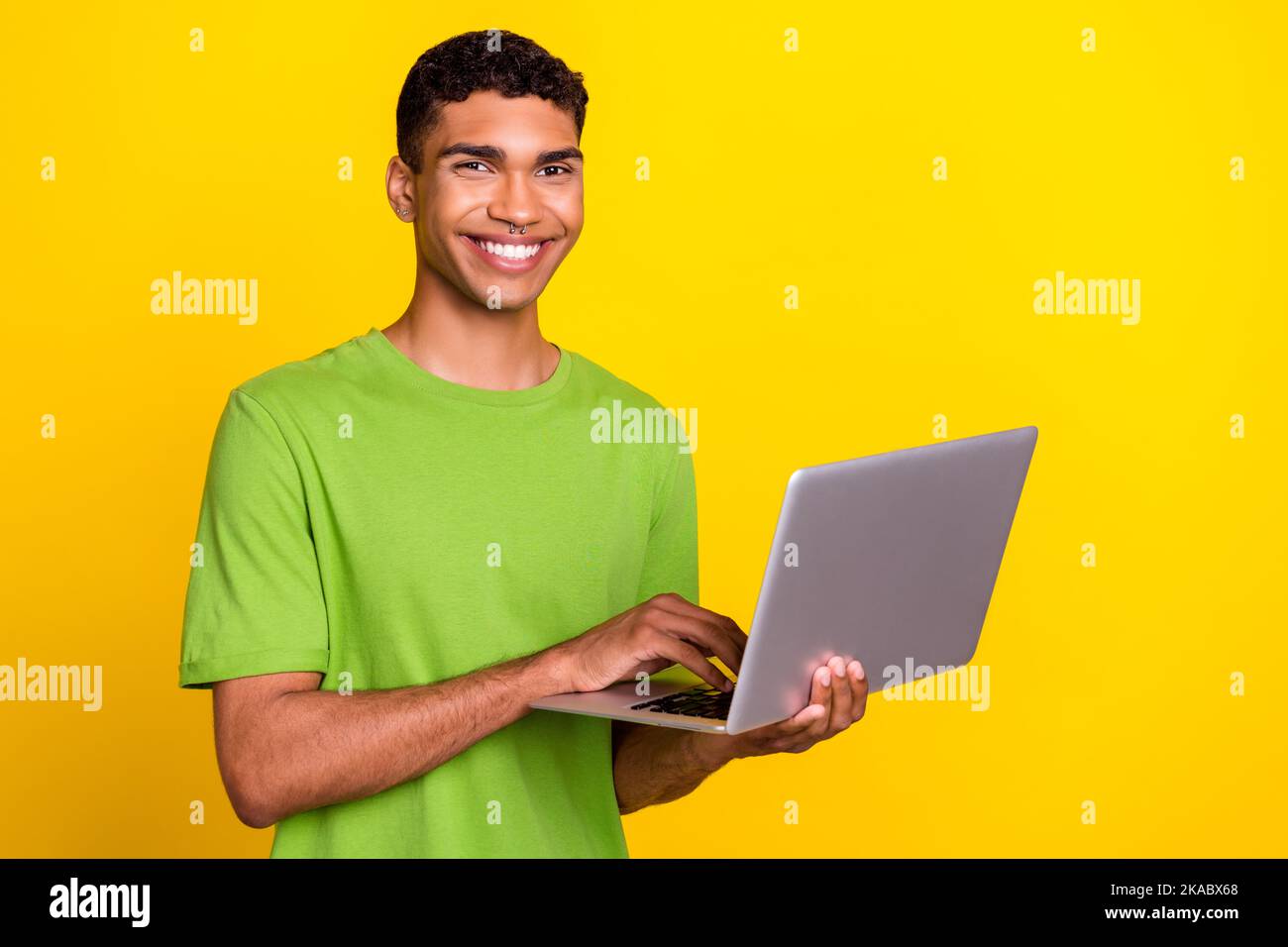 Photo of young attractive handsome smiling happy man hold laptop ...