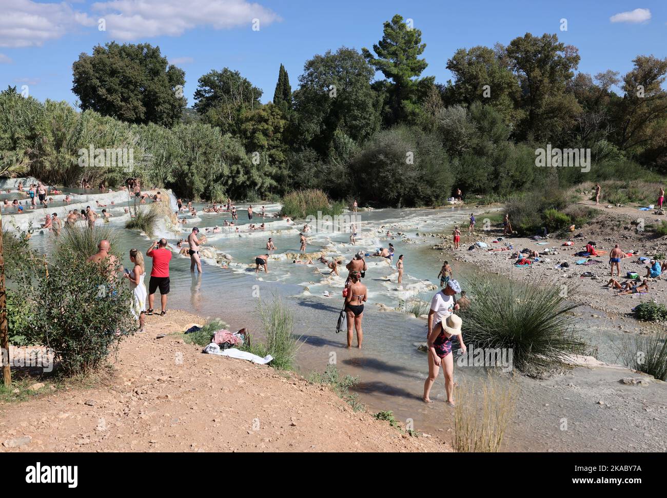 Saturnia, Italy - September 13, 2022: People are bathing in the hot ...