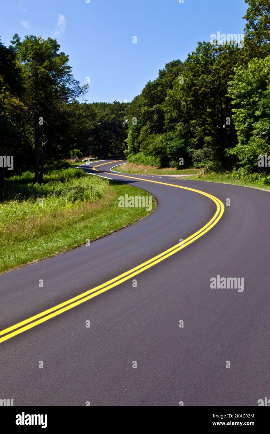 Beautiful scenic country road curves through Shenandoah National Park ...