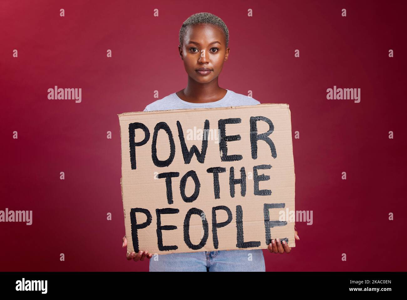 Poster, woman and studio banner power to the people sign by black woman ...