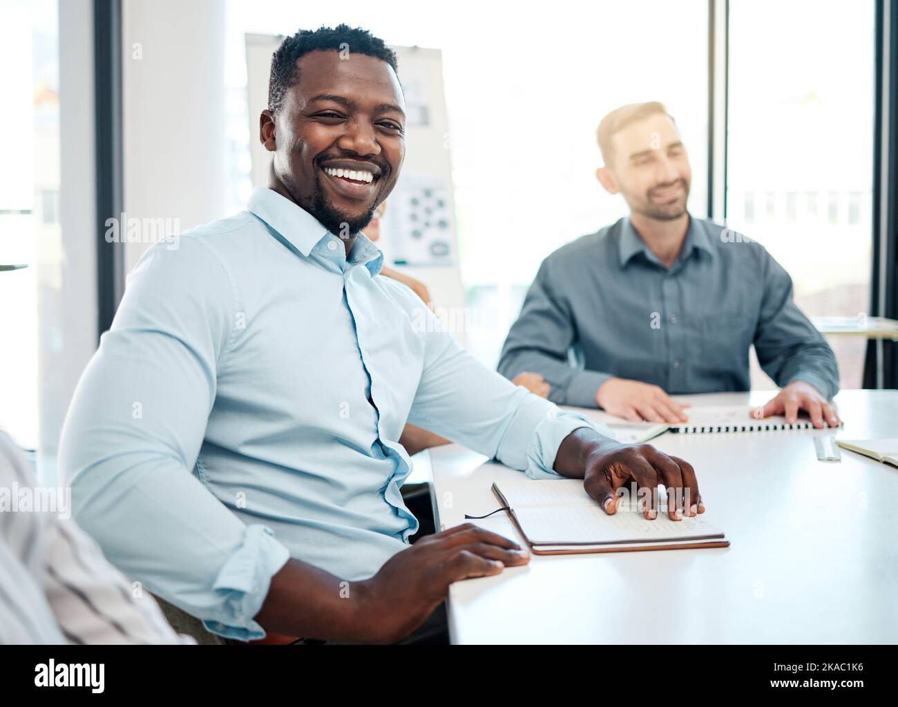 Meeting, corporate and portrait of African businessman sitting in the ...