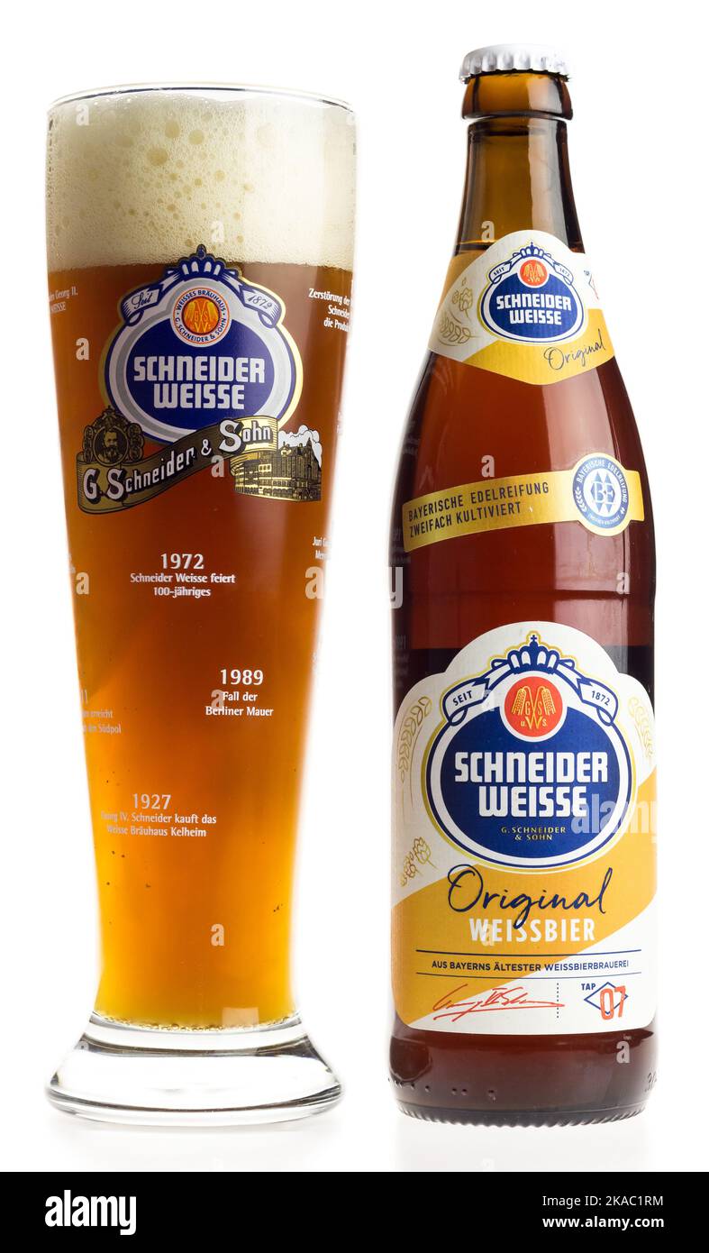 Bottle and glass of german Schneider Weisse beer isolated on a white ...
