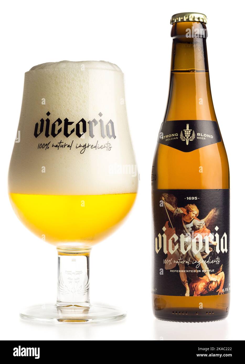 Bottle and glass of Victoria Strong Blond beer isolated on a white ...