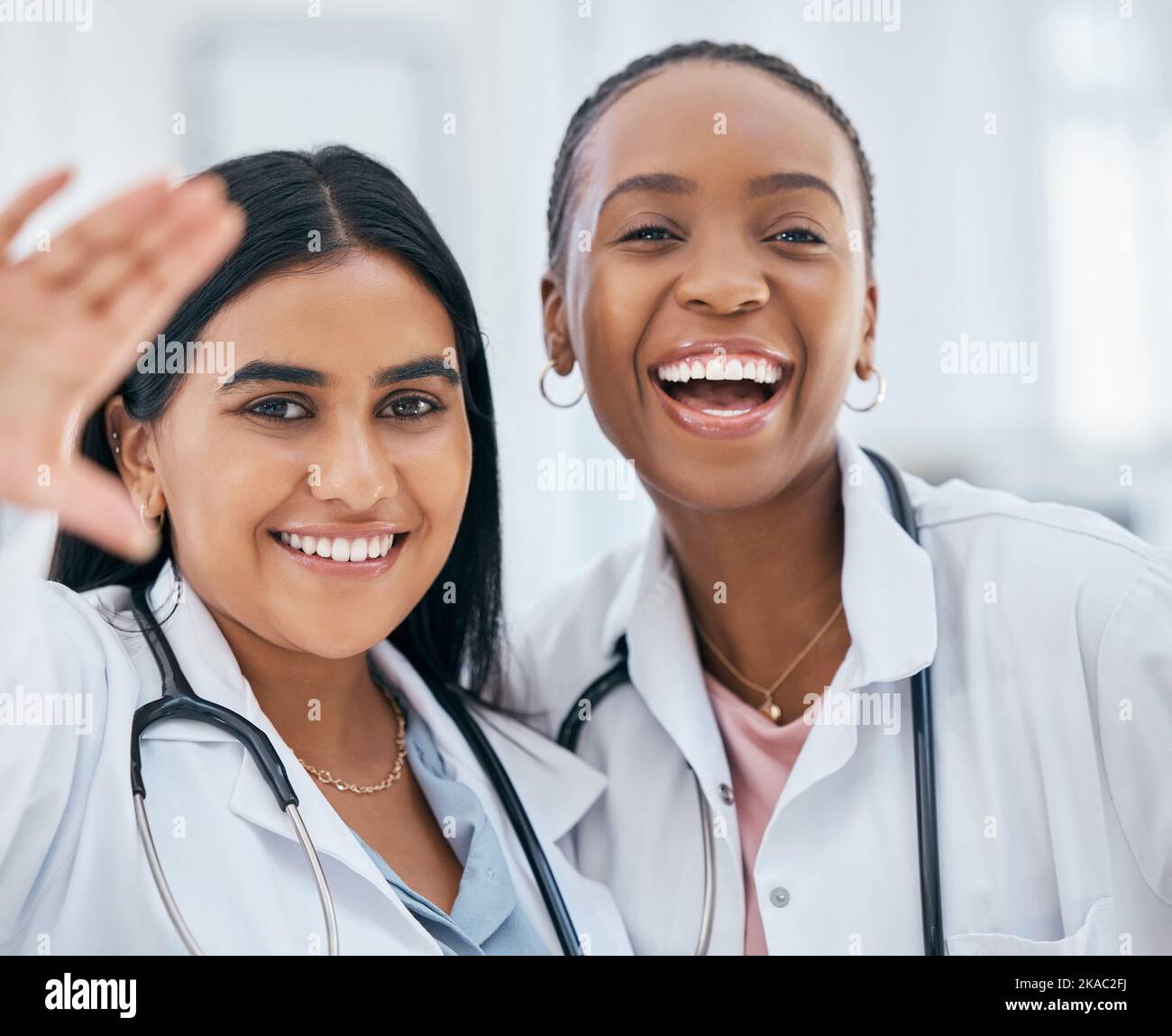 Nurse, doctor and selfie of women happy in a hospital and wellness health clinic with a smile ...