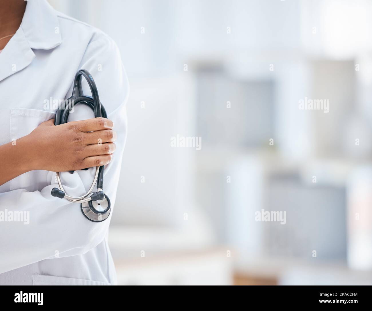 Doctor hand, stethoscope and hospital employee ready for healthcare and ...