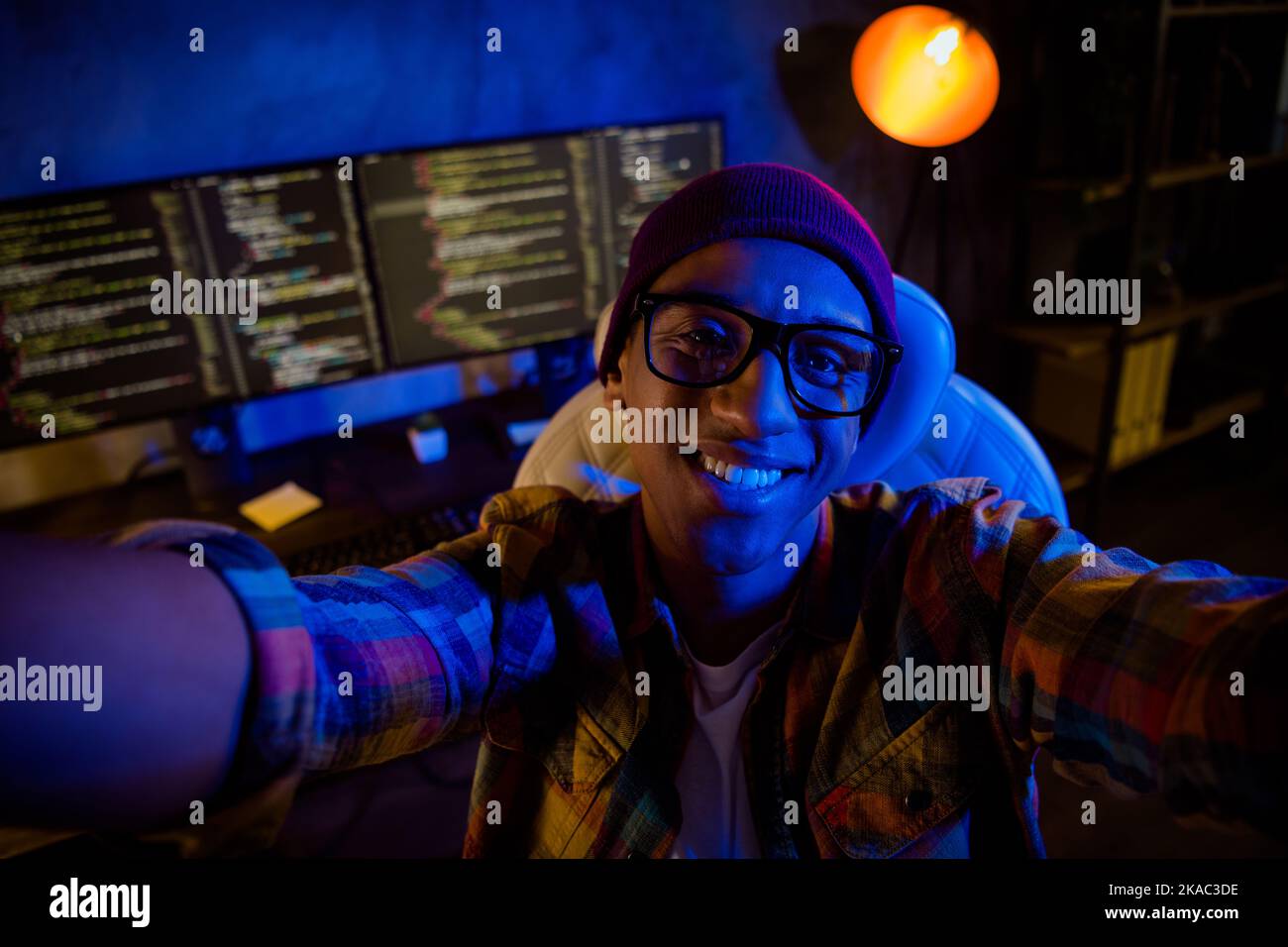 Portrait of cheerful web designer toothy smile take selfie late evening ...