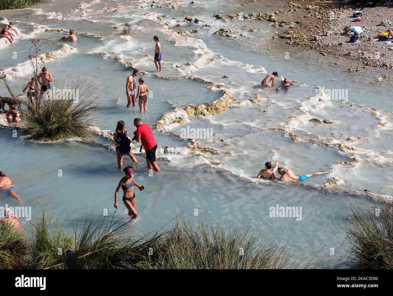 Saturnia, Italy - September 13, 2022: People are bathing in the hot ...