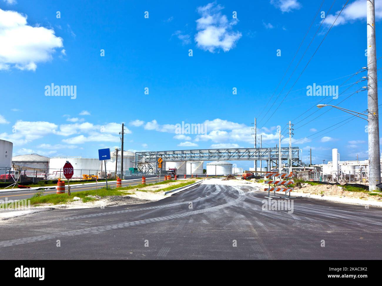 entrance of refinery with tanks Stock Photo - Alamy