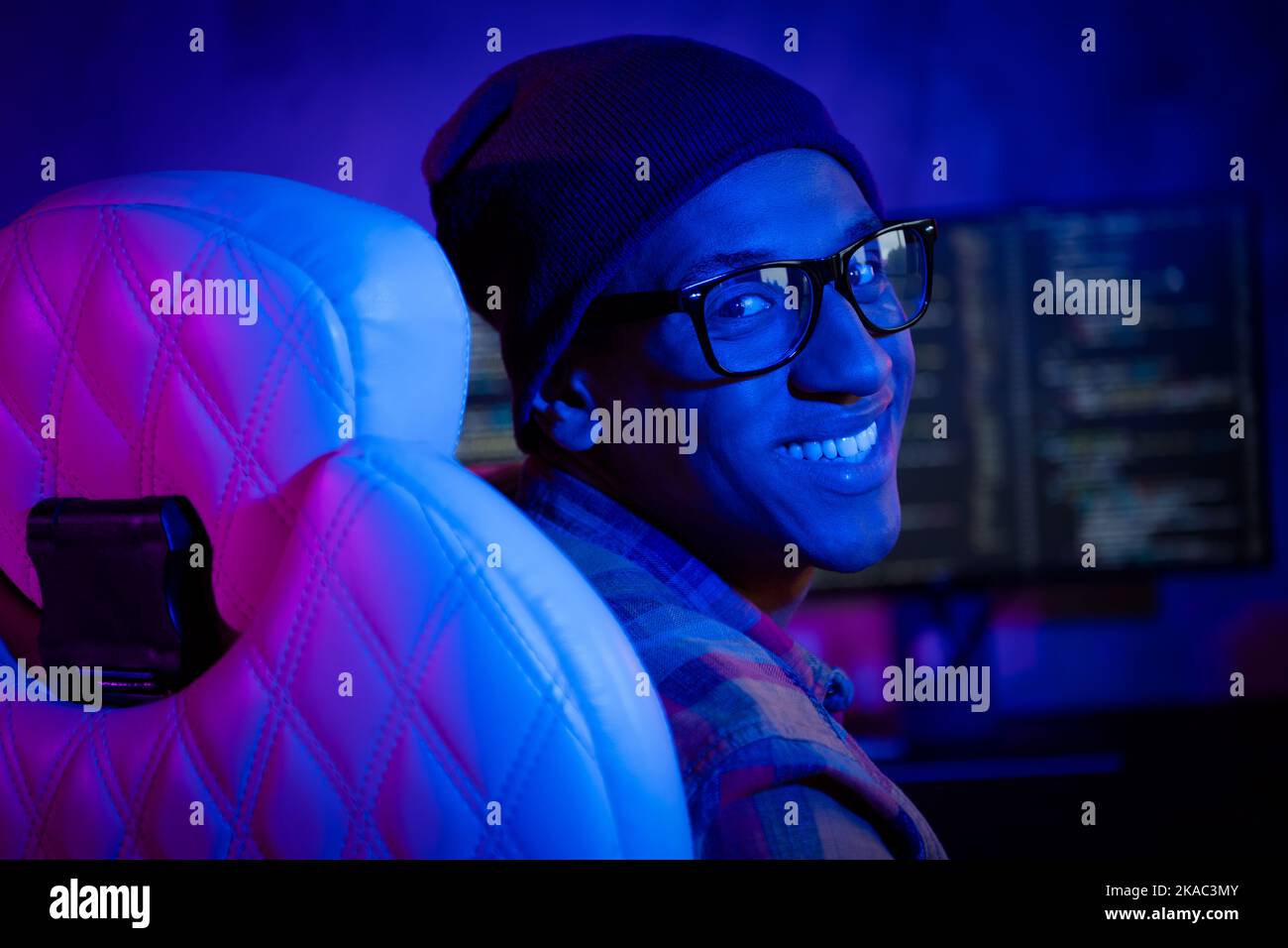 Profile portrait of positive hacker guy sitting chair toothy smile ...