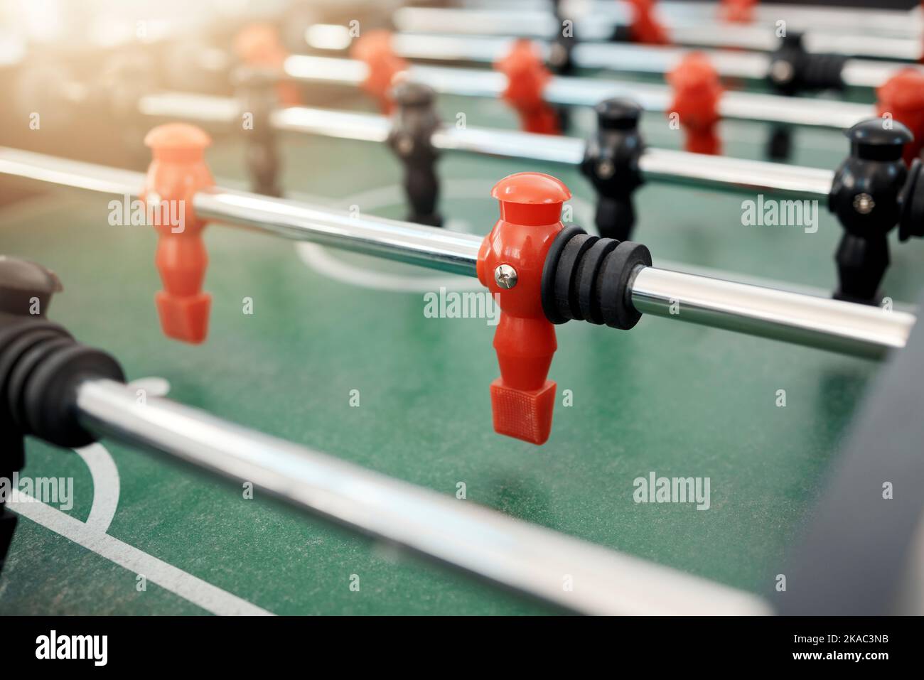 Foosball, game and table for entertainment, fun and team activity with ...