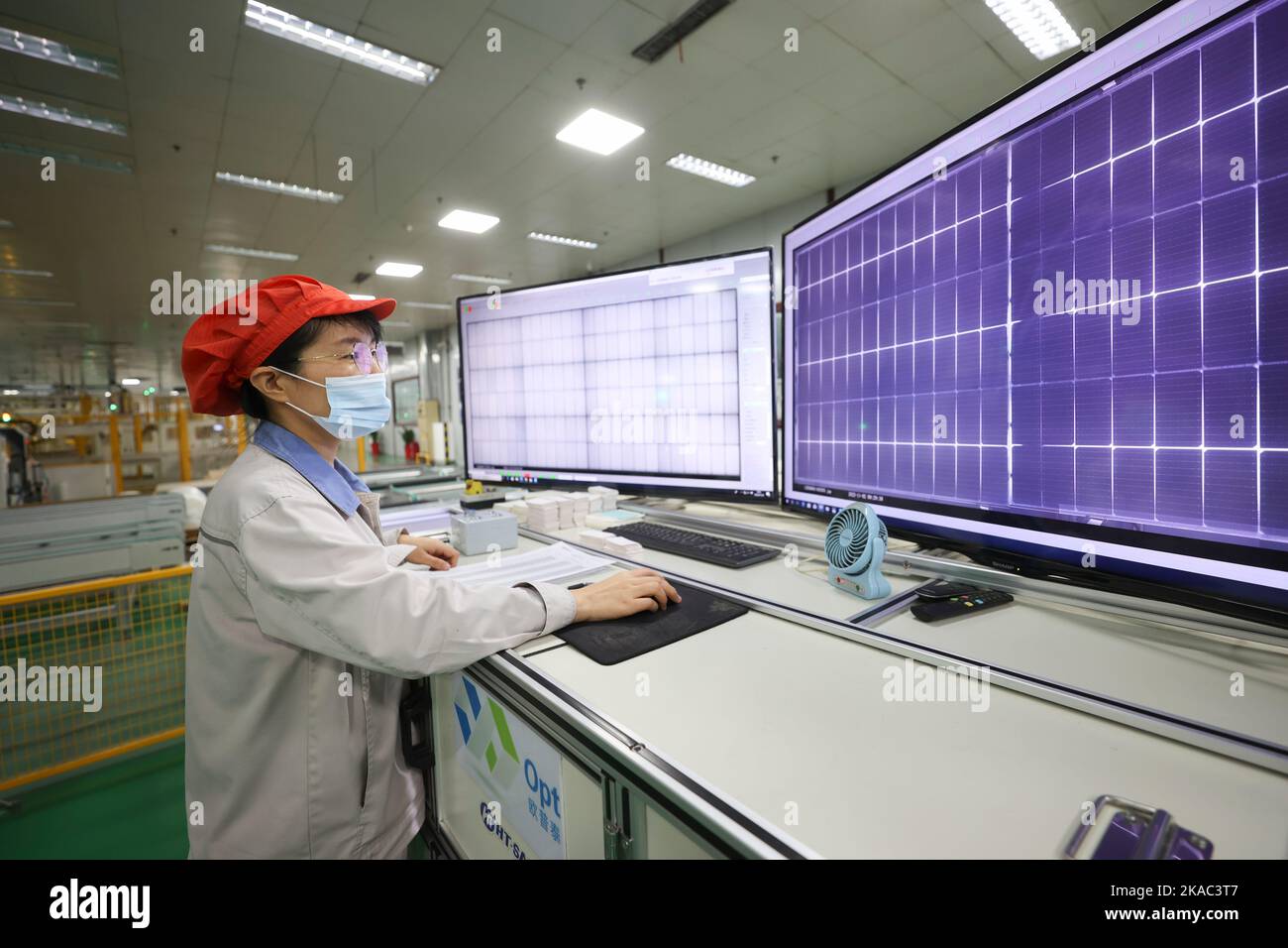 Workers are busy manufacturing the export solar photovoltaic panels in ...