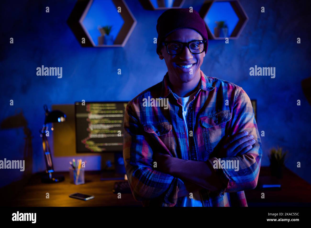 Portrait of positive successful professional hacker folded hands toothy ...