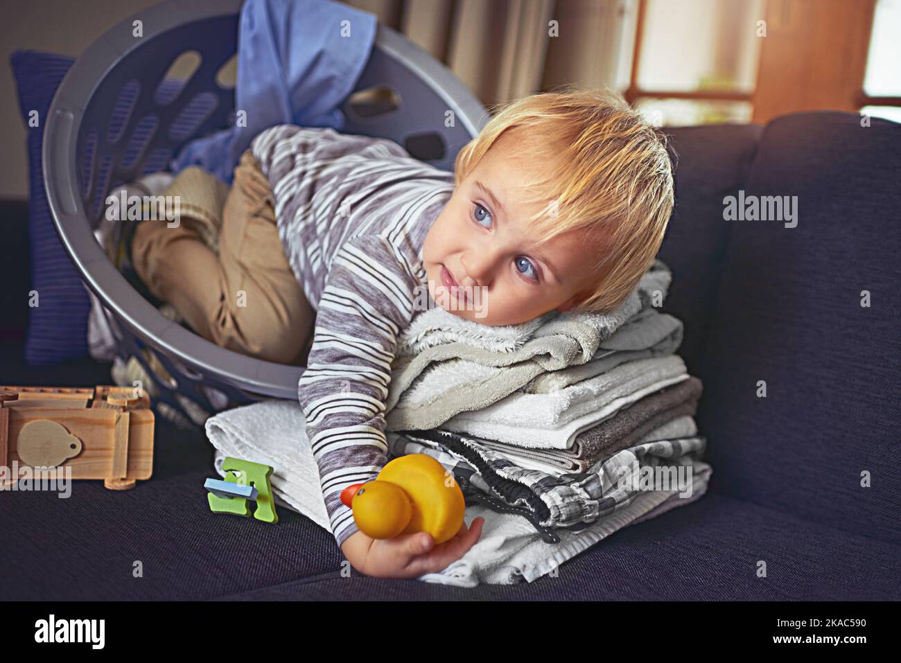 So soft it feels like a teddy bear. an adorable little boy curled up ...