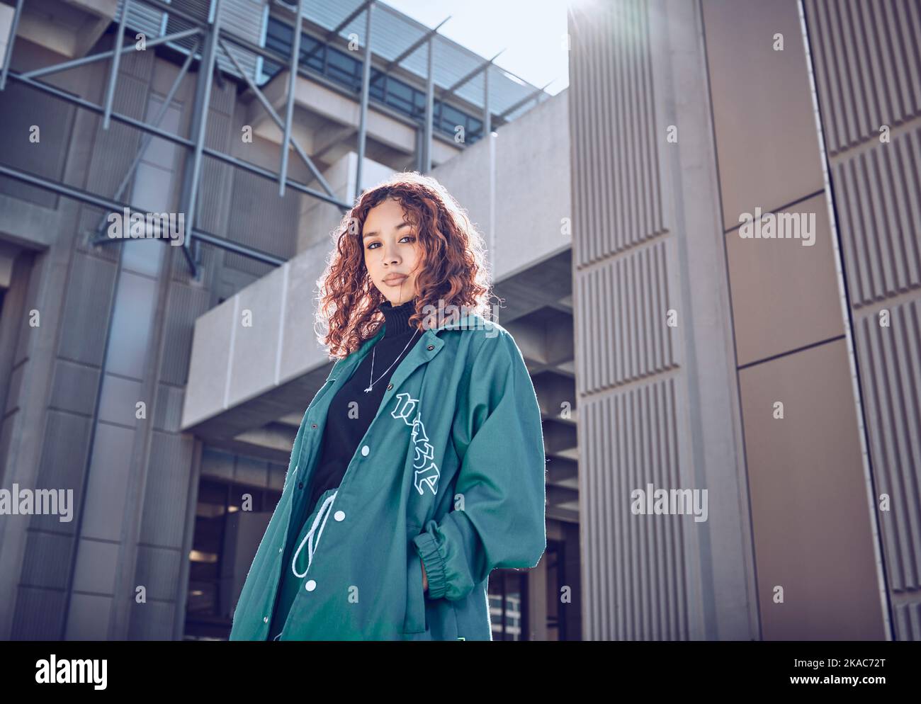 Fashion, urban and portrait of a woman on travel holiday with buildings ...