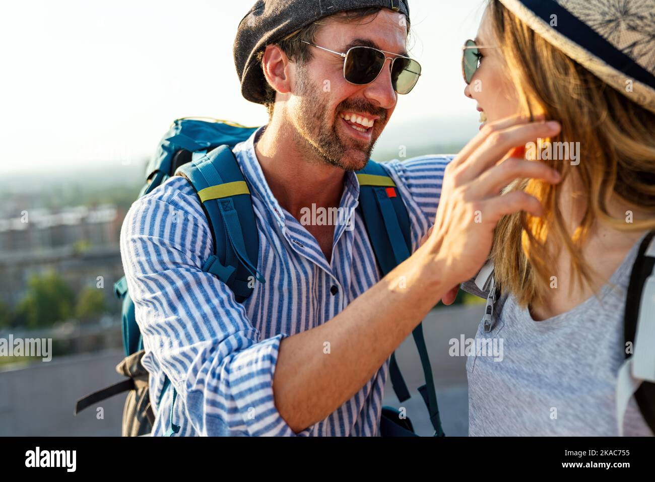 Happy couple on vacation sightseeing city with map. People travel fun ...