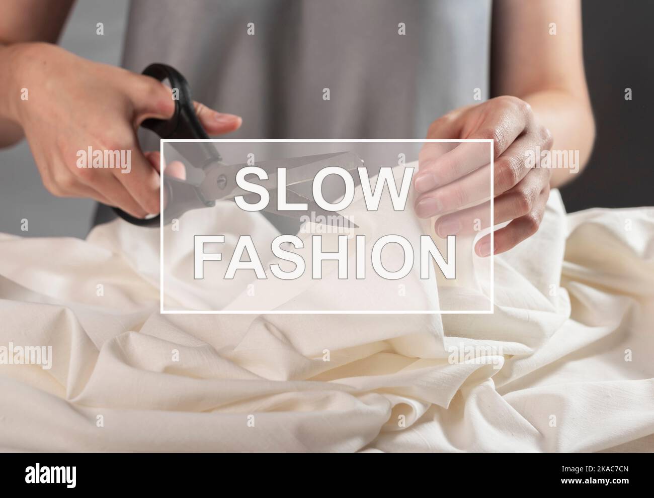 Slow fashion concept. Dresmaker sewing, making garment Stock Photo - Alamy