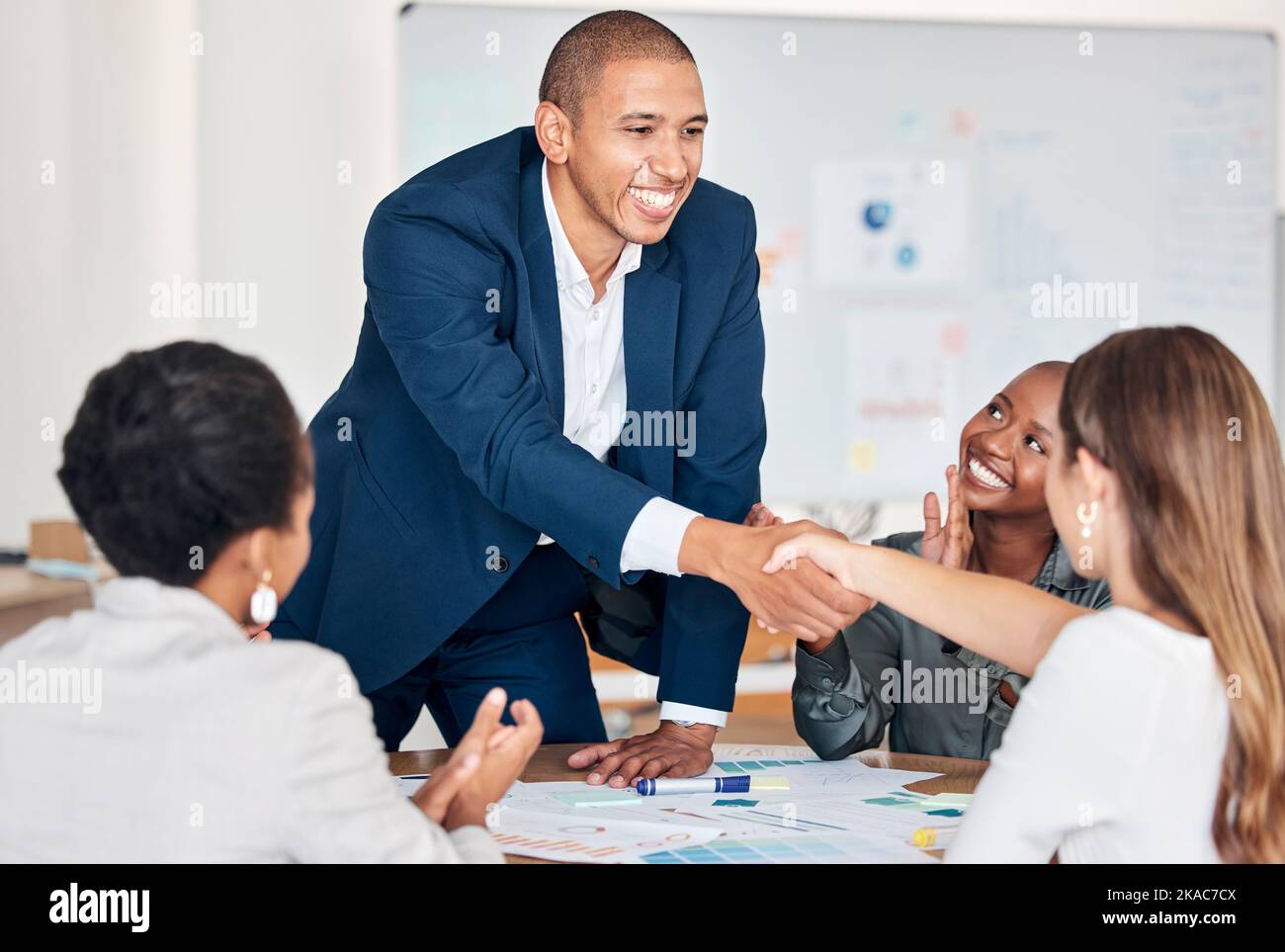Team, business people with support, handshake for congratulations ...