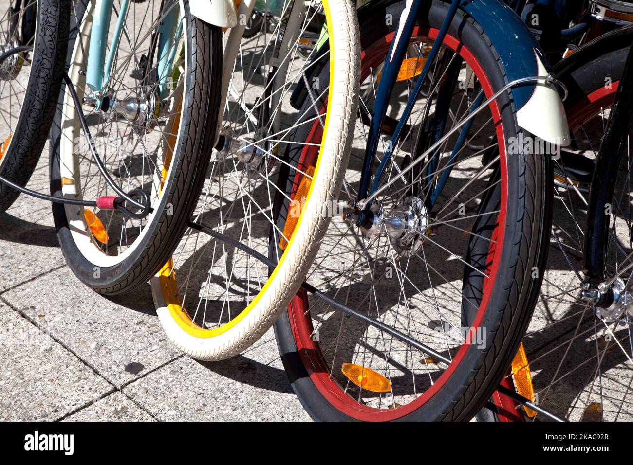 bicycle wheels lined up Stock Photo - Alamy