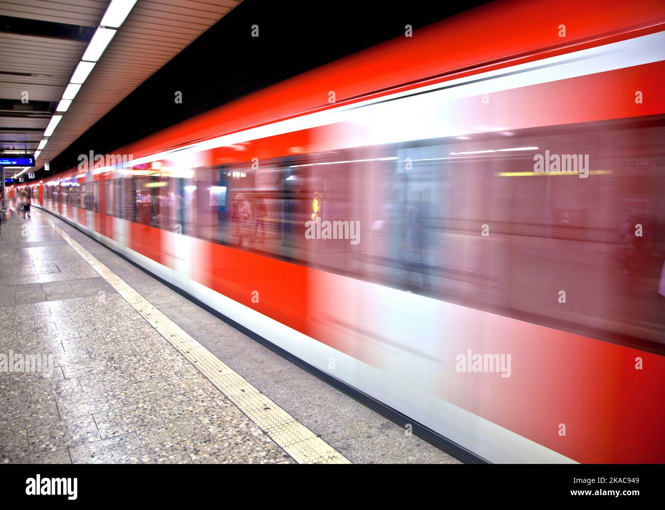 red Train arriving in the station Stock Photo - Alamy