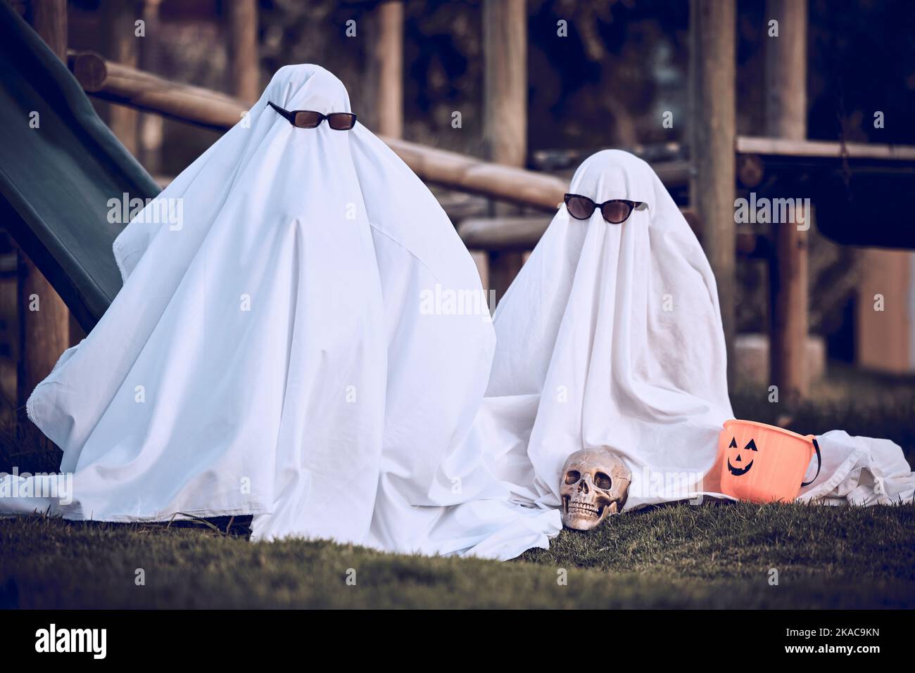 Halloween, glasses and people in ghost costume for trick or treat ...