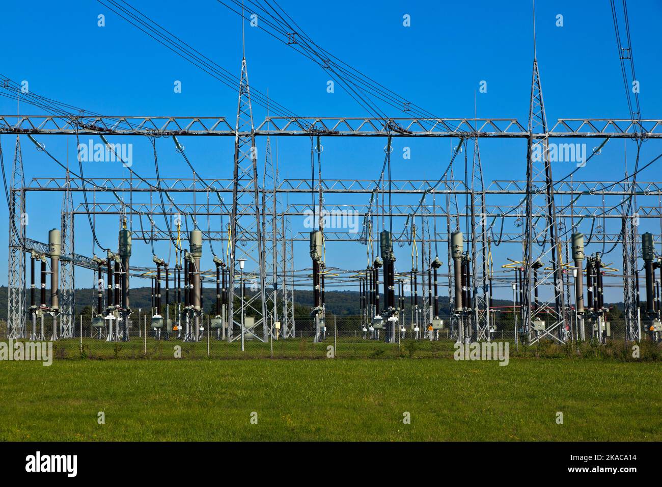 electrical power plant in beautiful colorful meadow Stock Photo - Alamy
