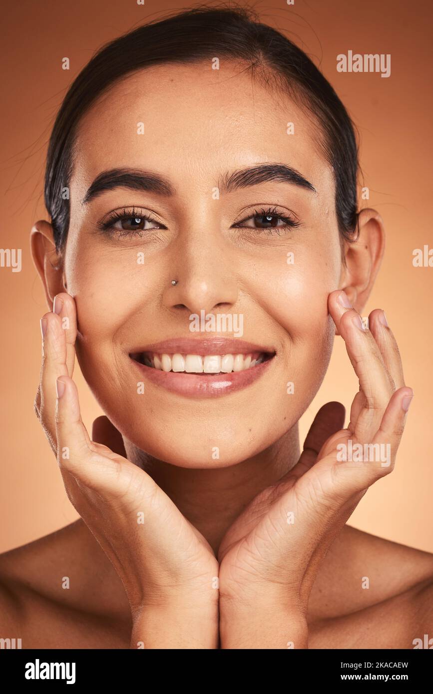 Portrait, skincare and woman face for natural beauty, organic facial and smile in brown studio ...