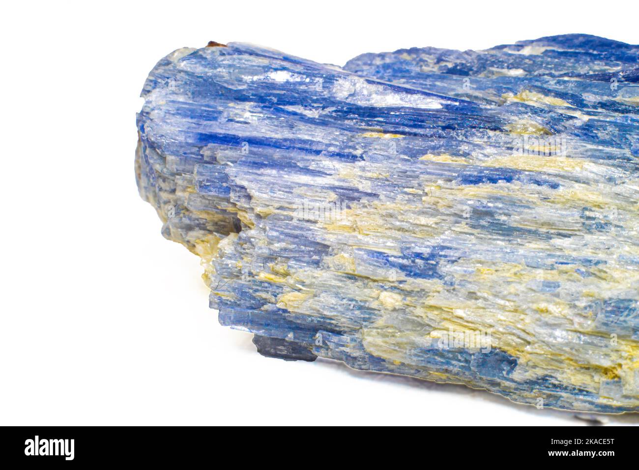 Raw vibrantly blue kyanite crystal stone chunk close up isolated on a ...